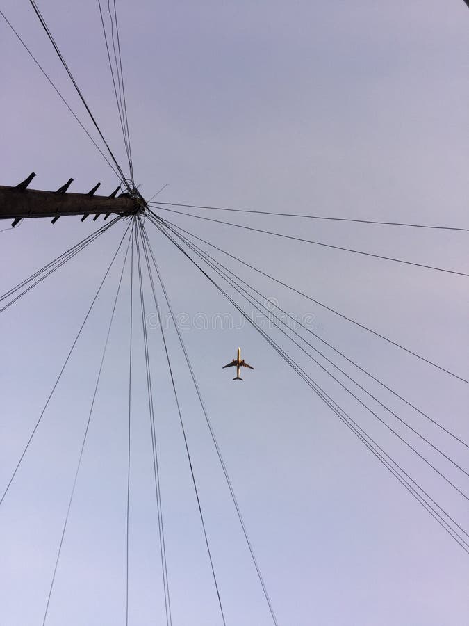 Plane flying overhead stock photo. Image of looking - 100726588