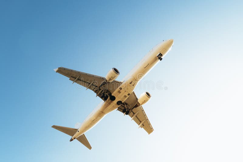 Plane Flying Seen from Below Stock Photo - Image of isolated, airplane ...