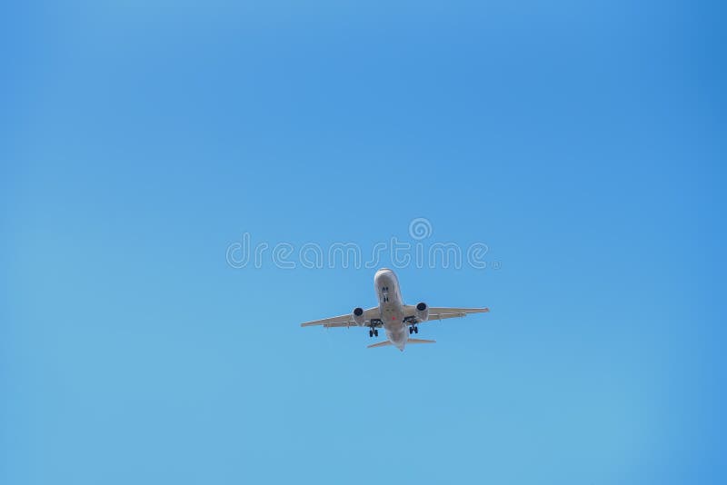 The Plane Flying in the Sky a Close Up the Bottom View Stock Photo ...