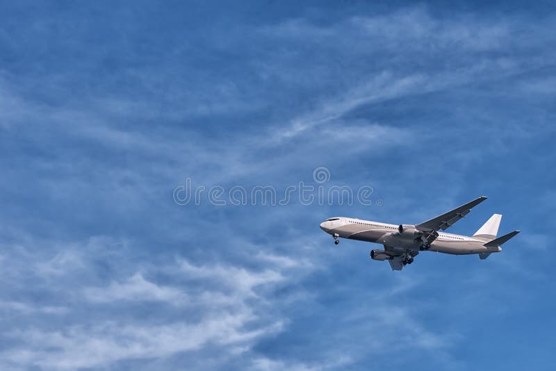 The Plane Flying in the Sky a Close Up the Bottom View Stock Photo ...