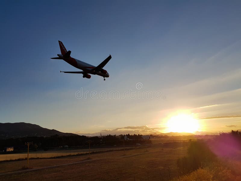 Plane Flying To the Center of the Sun Editorial Stock Photo - Image of ...