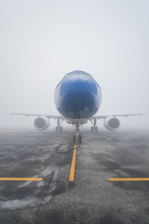 The plane in the fog stock image. Image of commercial - 88646853