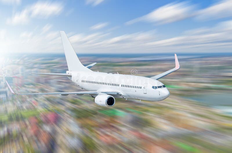 The Plane at High Speed Flies Over the City Stock Photo - Image of ...