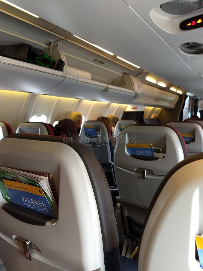 In the plane. Cabin. editorial stock photo. Image of bicycle - 124490858