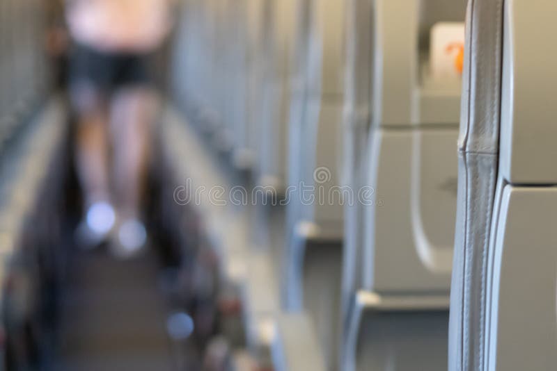 Plane Inside, Cabin of Airplane, Passenger Seats Blurred Background ...