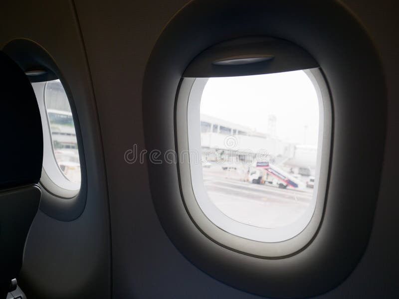 Aircraft Window With Plane With Rainy Window And Raindrops Stock Image ...