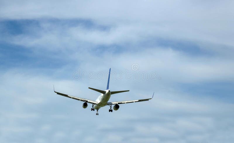 The plane is landing stock photo. Image of travel, business - 116877892