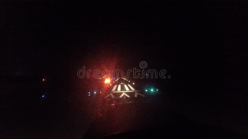 Plane Landing at the Airport during the Night. the View from the ... Plane Landing at the Airport during the Night. the View from the ...