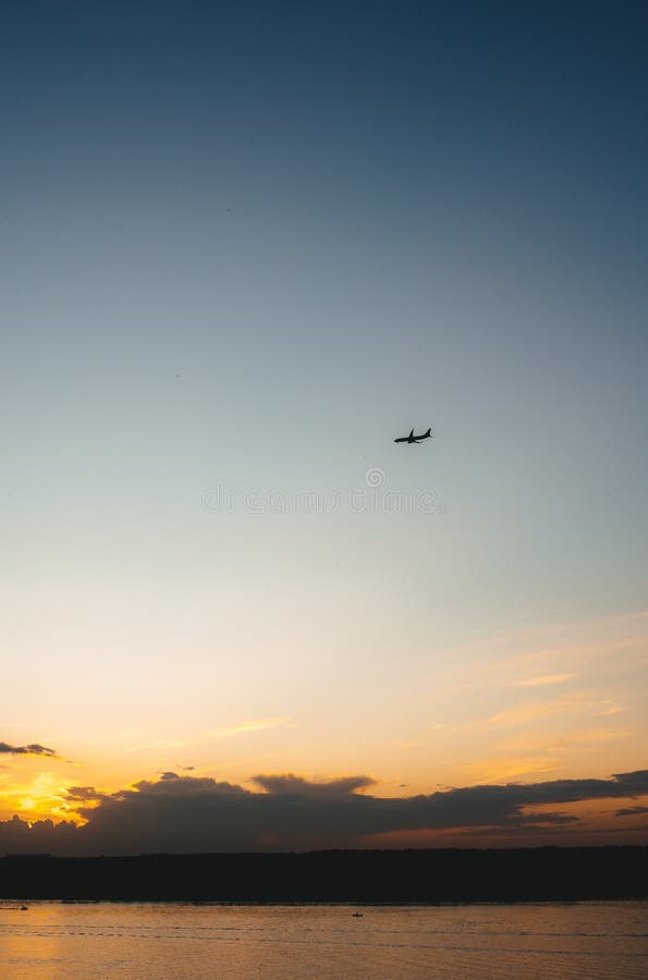 Plane Over the Horizon. Sunset Sky Stock Image - Image of horizon, dawn ...