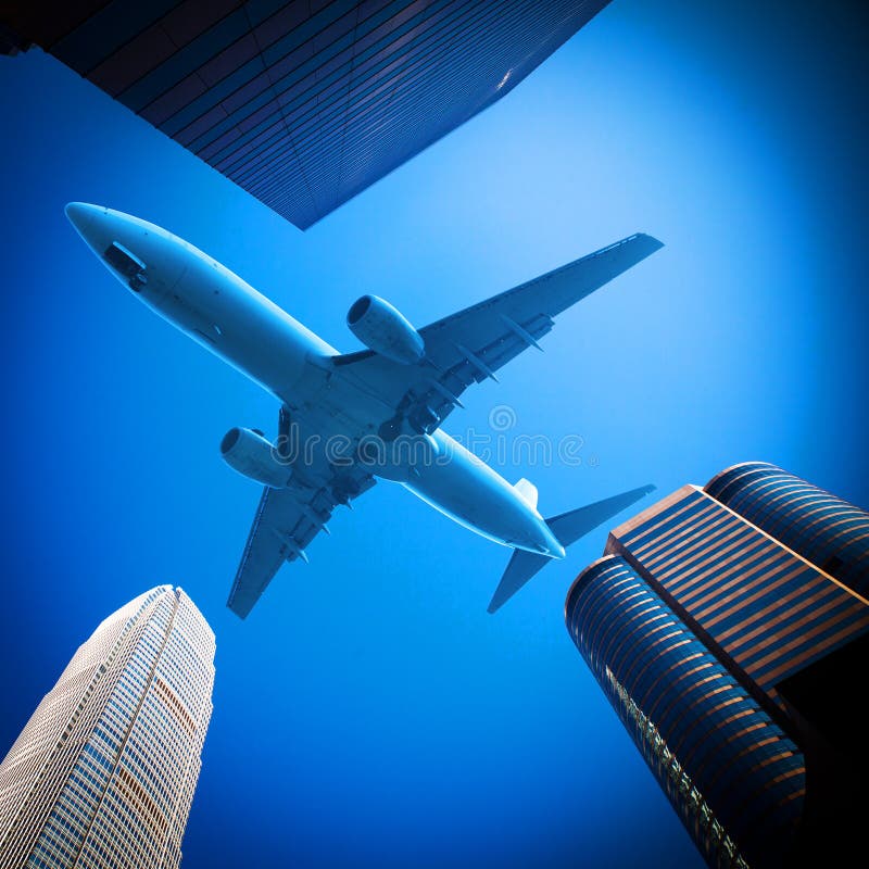 Airplane Over Office Building Stock Photo - Image of land, china: 4148724