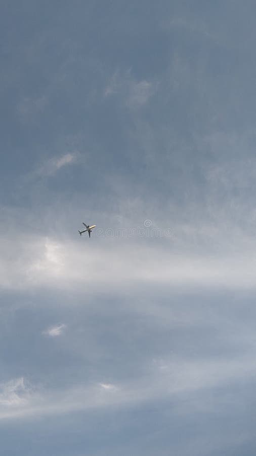 A Plane Passing by in the Afternoon Stock Photo - Image of wave, wing ...