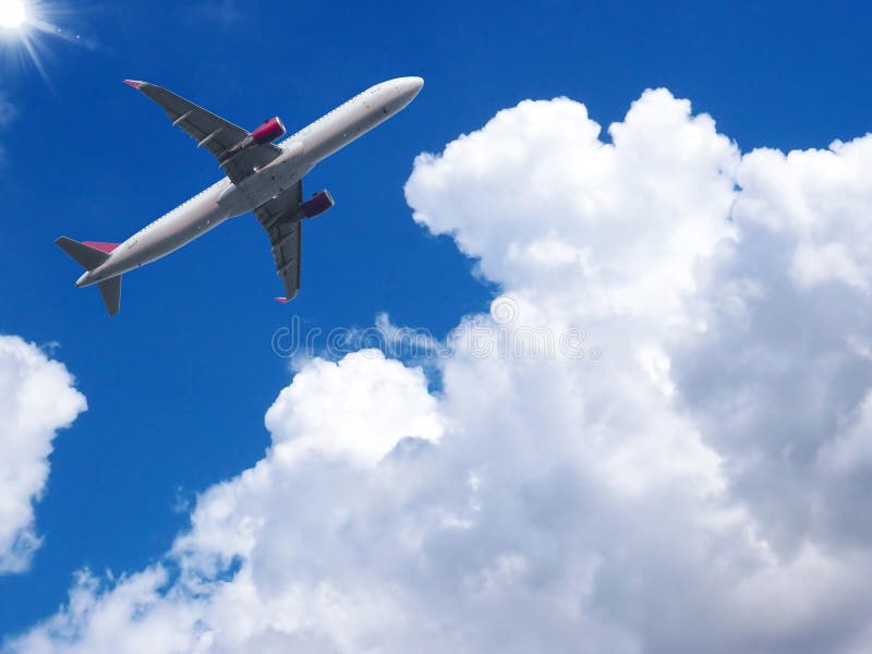 The Plane Passing through Clouds Stock Photo - Image of commercial ...
