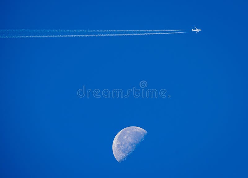 Plane Passing Over the Half Moon Stock Photo - Image of full, dark ...