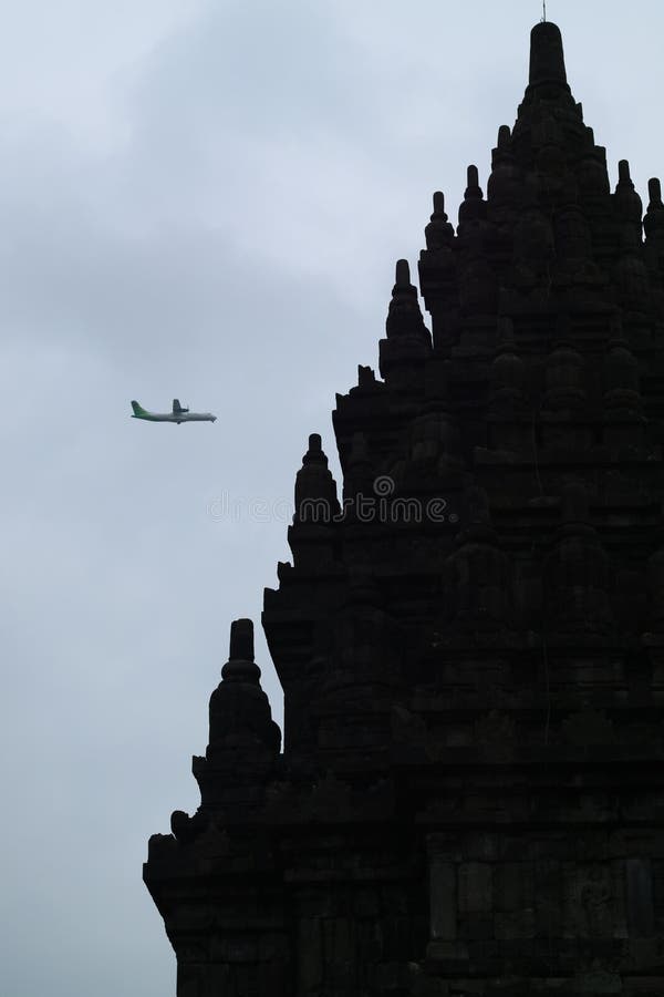 Plane Passing Prambanan Temple Stock Photo - Image of plane, passing ...