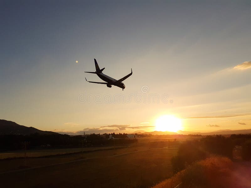 Plane Flying To the Center of the Sun Editorial Photo - Image of plane ...