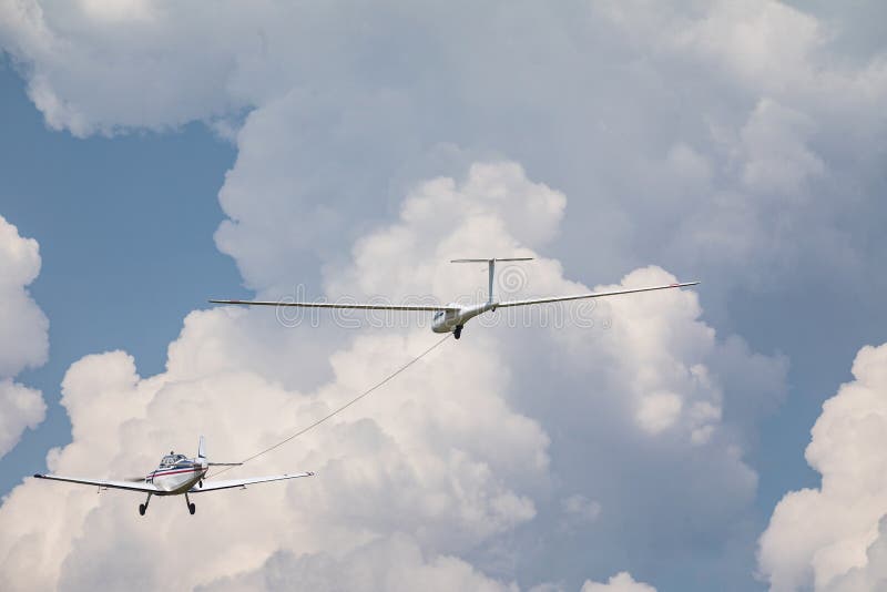 Plane Pulling of a Glider, a Small Sports Plane Pulls a Glider into the ...