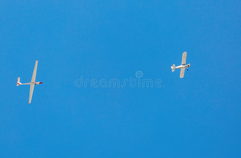 Pull Up a Glider by a Motorized Airplane Stock Photo - Image of boarder ...