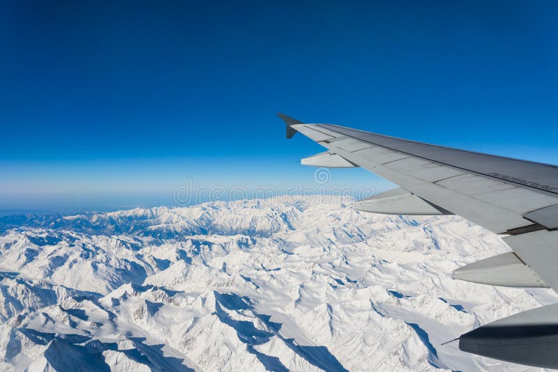 Plane snow mountain stock photo. Image of aerial, high - 42703216
