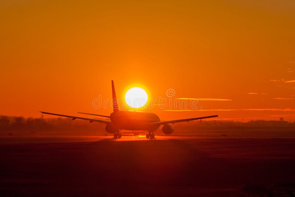 Plane in sunset stock image. Image of evening, orange - 37246709