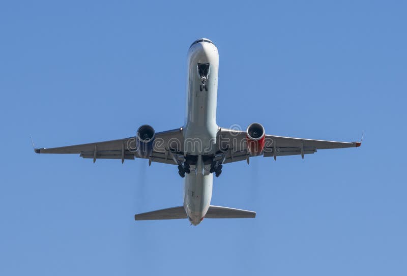 Plane take off- blue sky stock image. Image of plane - 85154753