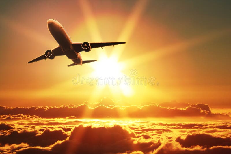 Plane takes off at sunrise stock photo. Image of sunlight - 60041050