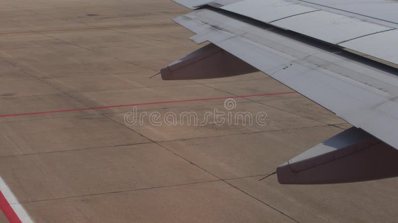The Plane Takes Off, the Wing Flaps Open, There is Maneuvering. Stock ...