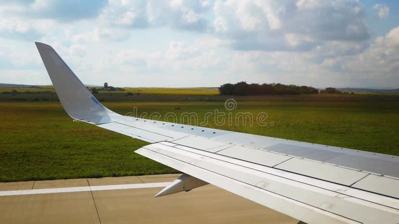 Plane Taking Off from Airport, View through an Airplane Window Stock ...