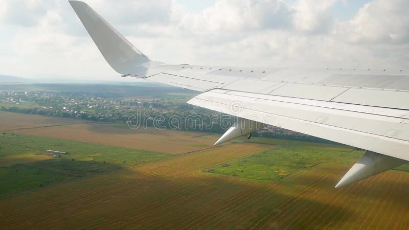 Plane Taking Off from Airport, View through an Airplane Window Stock ...