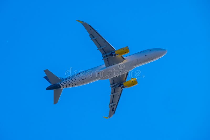 Plane Taking Off Landing Over Blue Sky Editorial Stock Photo - Image of ...