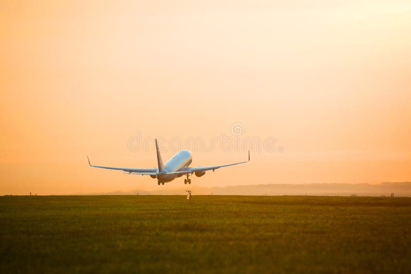 Plane taking off sunset stock image. Image of plane, takeoff - 66333265