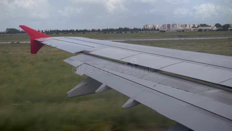 The Plane Travels on the Ground. View from the Airplane Window To the ...