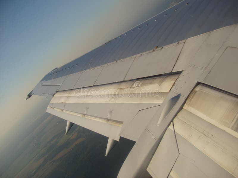 Plane wing stock photo. Image of taking, flight, airdyne - 1302424