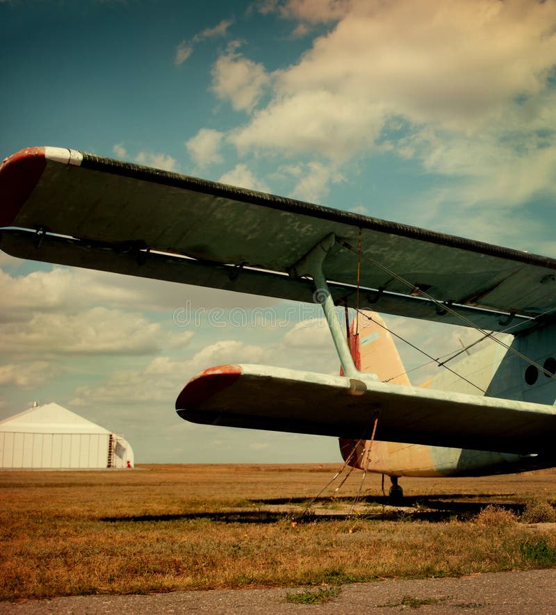 Plane Wing Against Autumn Field. Stock Photo - Image of clouds, pitch ...