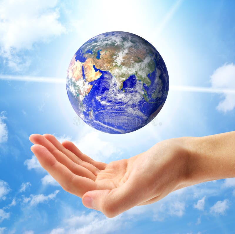 Planet Earth and Human Hand Stock Photo - Image of conceptual ...