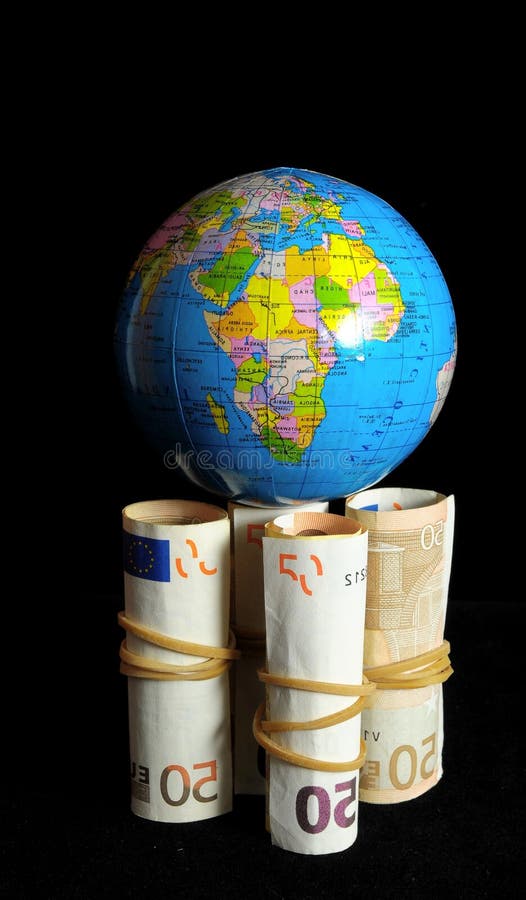 Planet Earth and Rolled Money Stock Image - Image of golden, coins ...