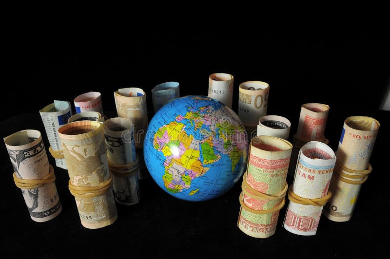 Planet Earth and Rolled Money Stock Image - Image of financial ...
