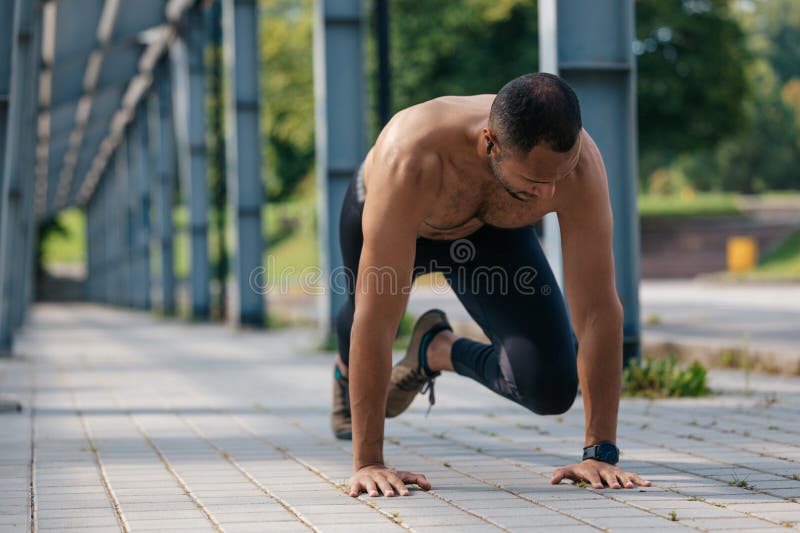Young Well-built African American Man Standing in Plank Stock Image ...