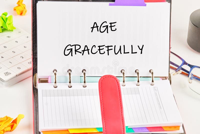 A Planner Opened To a Page that Reads Age Gracefully, Surrounded by ...