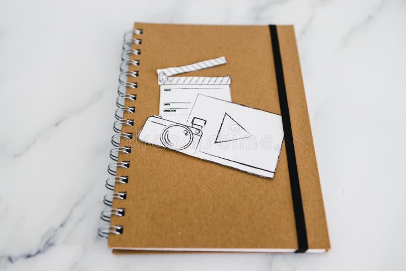 Planning Content for Social Media, Notebook with Photo and Video on it ...