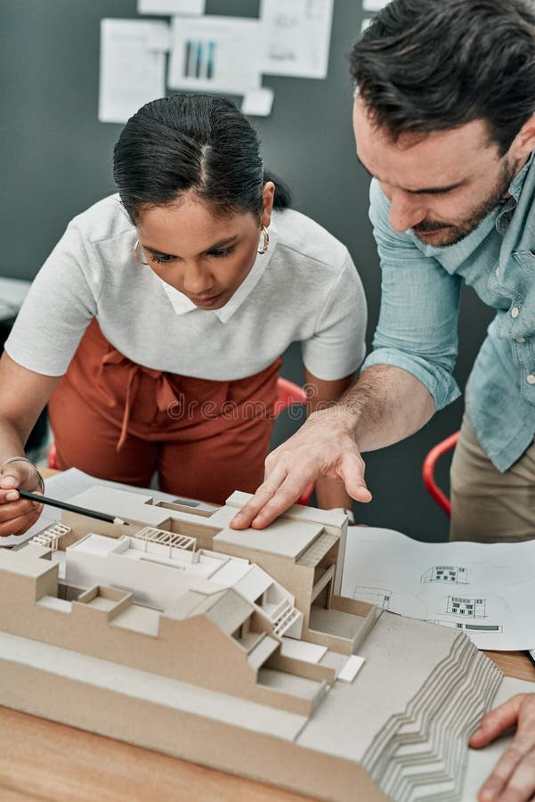 Planning Each Section of Their Construction. Two Architects Working ...