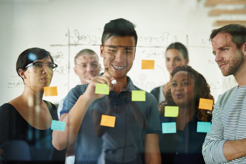 Planning is the First Step. Cropped Shot of a Group of Young Designers ...