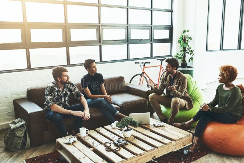 Planning is the First Step. a Group of Young Designers Having a ...