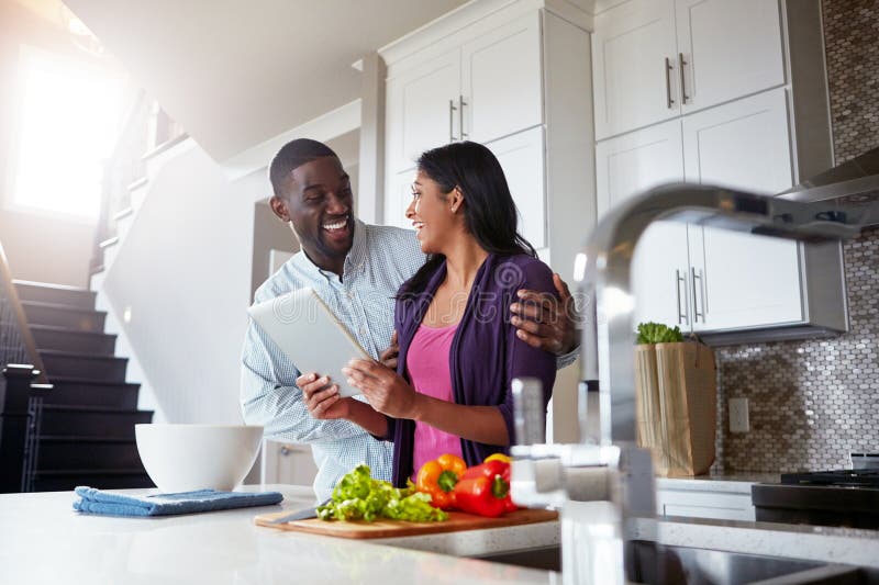 Planning a Menu with Modern Technology. a Young Couple Using a Digital ...