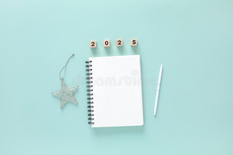 2025 Planning Note Book with Pen and Star Ornament Stock Image - Image ...