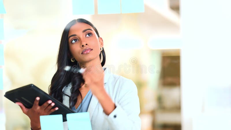 Planning Strategy, Thinking and Reading an Idea from a Tablet while ...