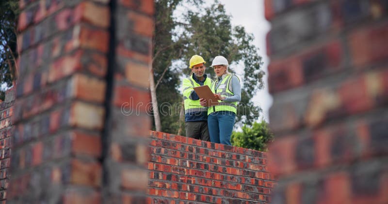 Planning, Teamwork and People at Construction Site of Floor Plan ...