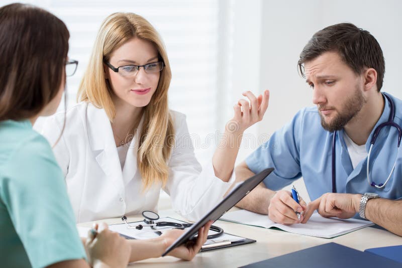 Planning the treatment stock image. Image of consultation - 52632693