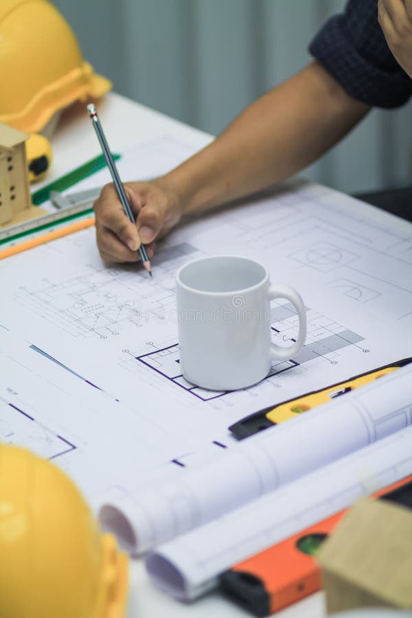 Plans and Documents are Placed on Desks in the Engineering Team`s ...