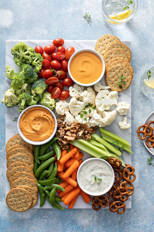 Plant Based Snack Board with Vegetables and Crackers Stock Photo ...