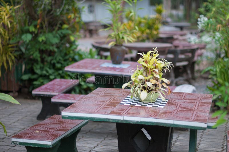 Plant Pot on Table in Garden Stock Image - Image of chair, beautiful ...